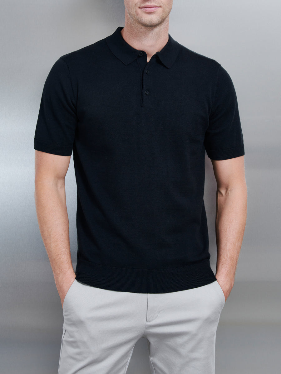 Cotton Knitted Button Polo Shirt in Black ARNE