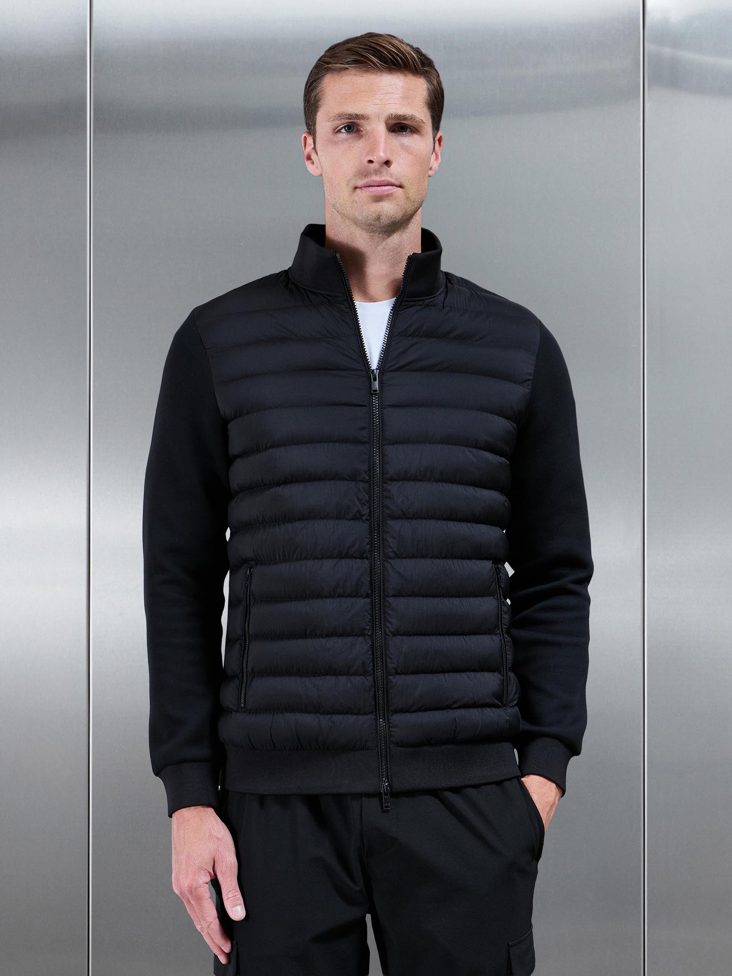Hybrid Quilted Technical Funnel Neck Jacket in Black | ARNE UK