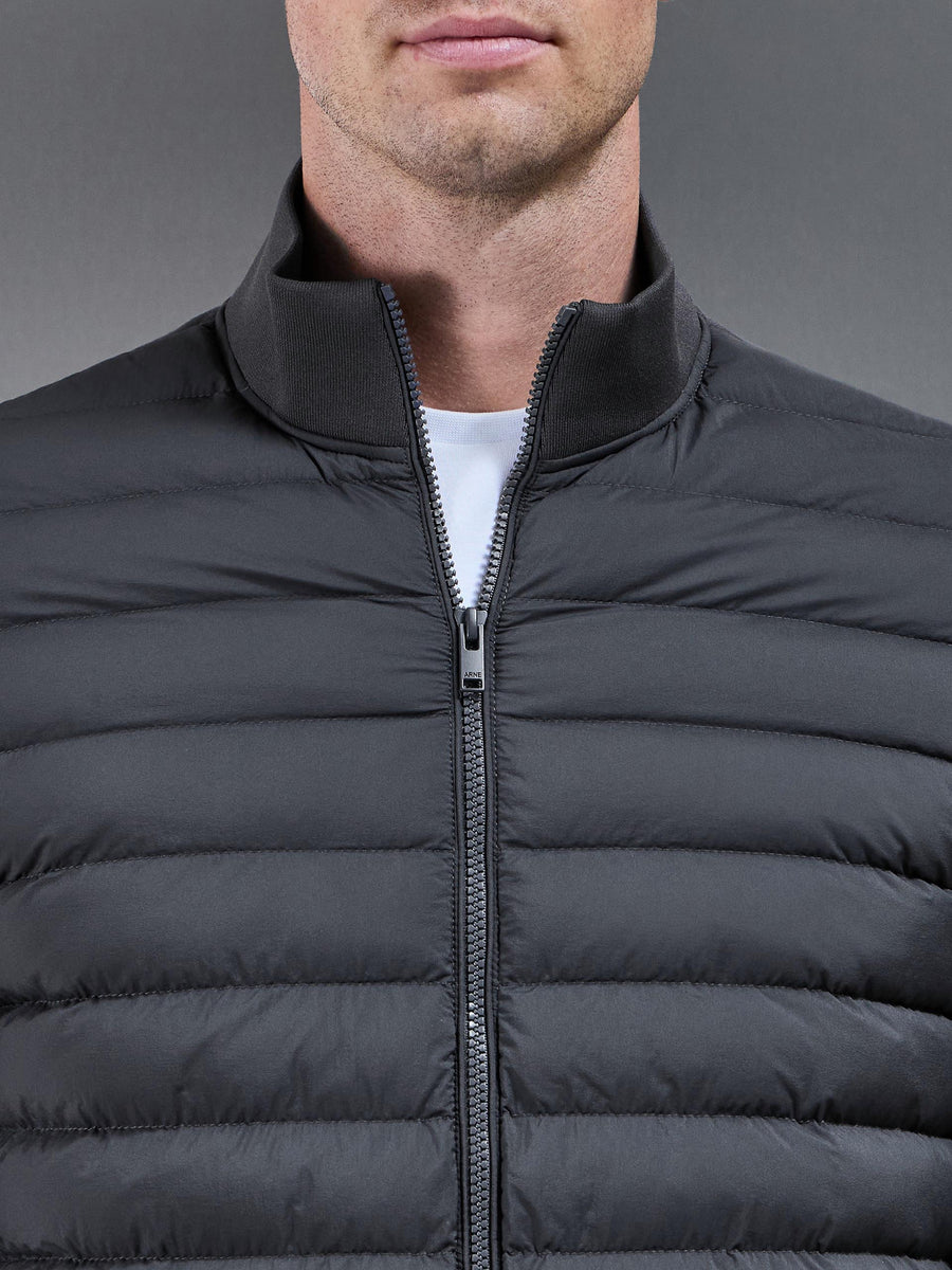 Hybrid Quilted Technical Funnel Neck Jacket in Grey | ARNE US