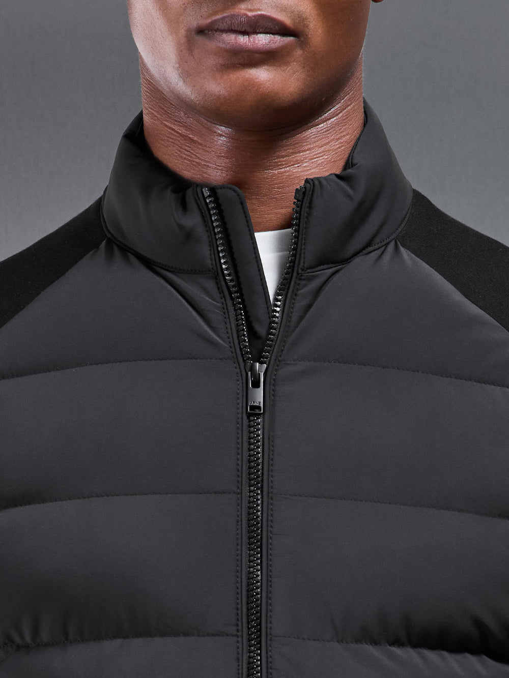 Hybrid Technical Puffer Jacket in Black | ARNE UK