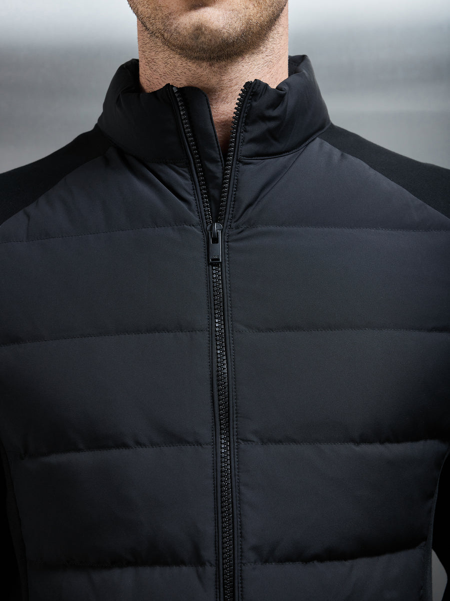 Hybrid Technical Puffer Jacket in Black ARNE