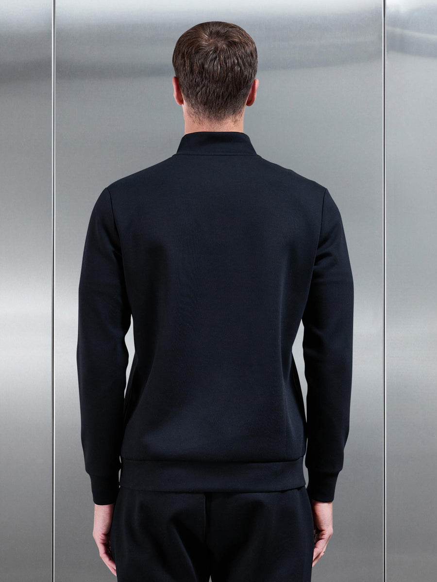 Interlock Jersey Half Zip in Black | ARNE UK