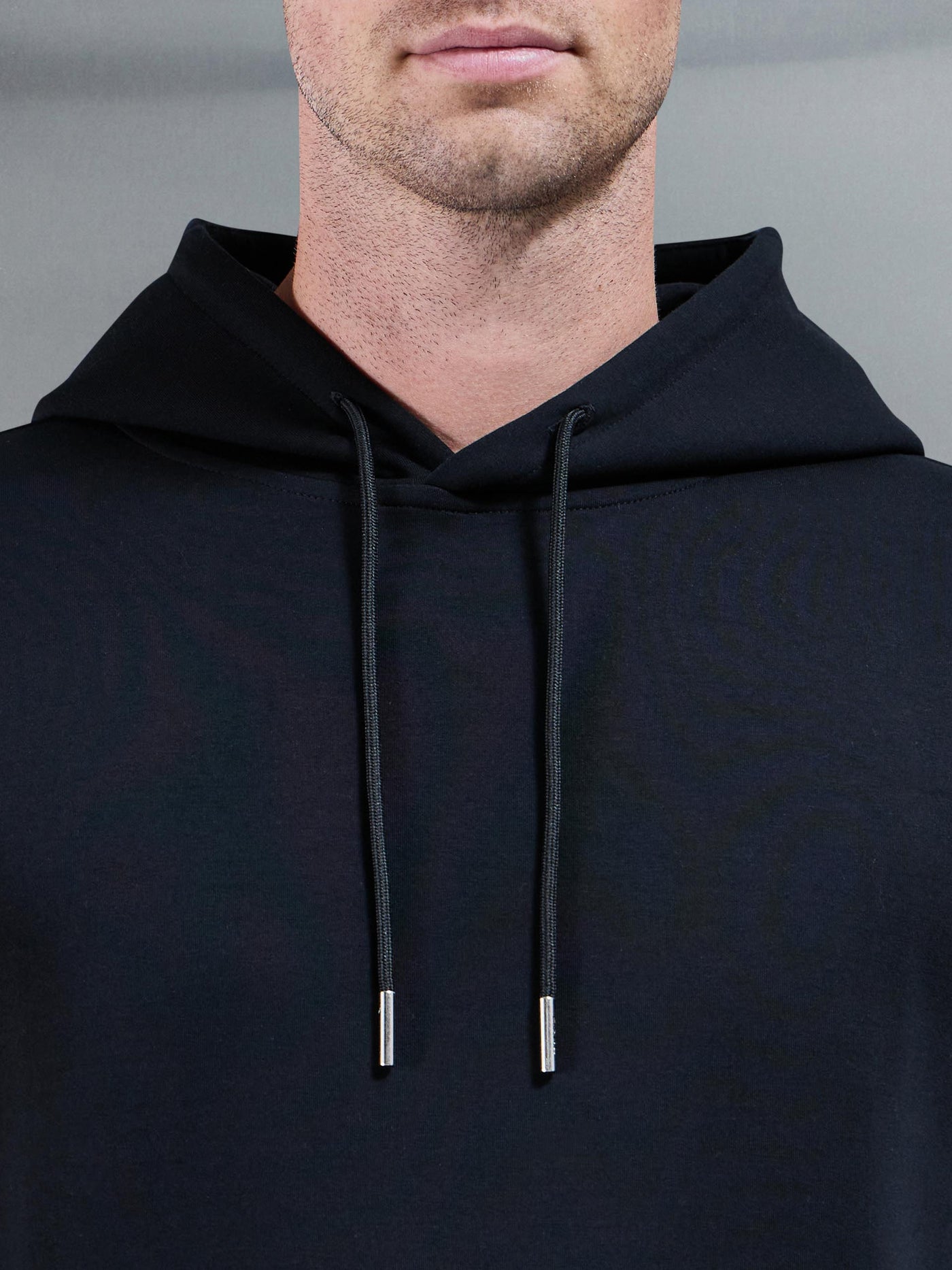 Interlock Jersey Hoodie in Black | ARNE UK