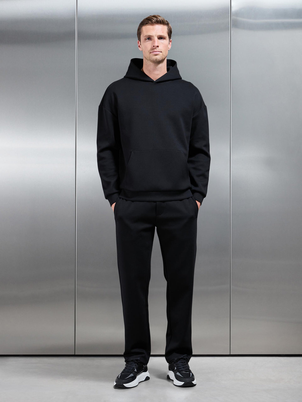 Interlock Jersey Relaxed Fit Hoodie in Black | ARNE UK