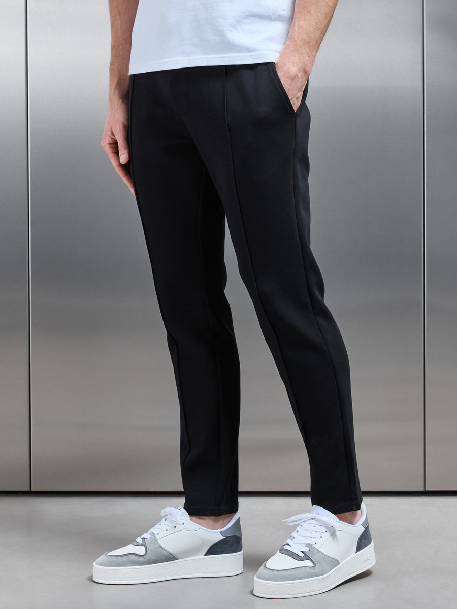 Interlock Jersey Tapered Jogger in Black | ARNE UK